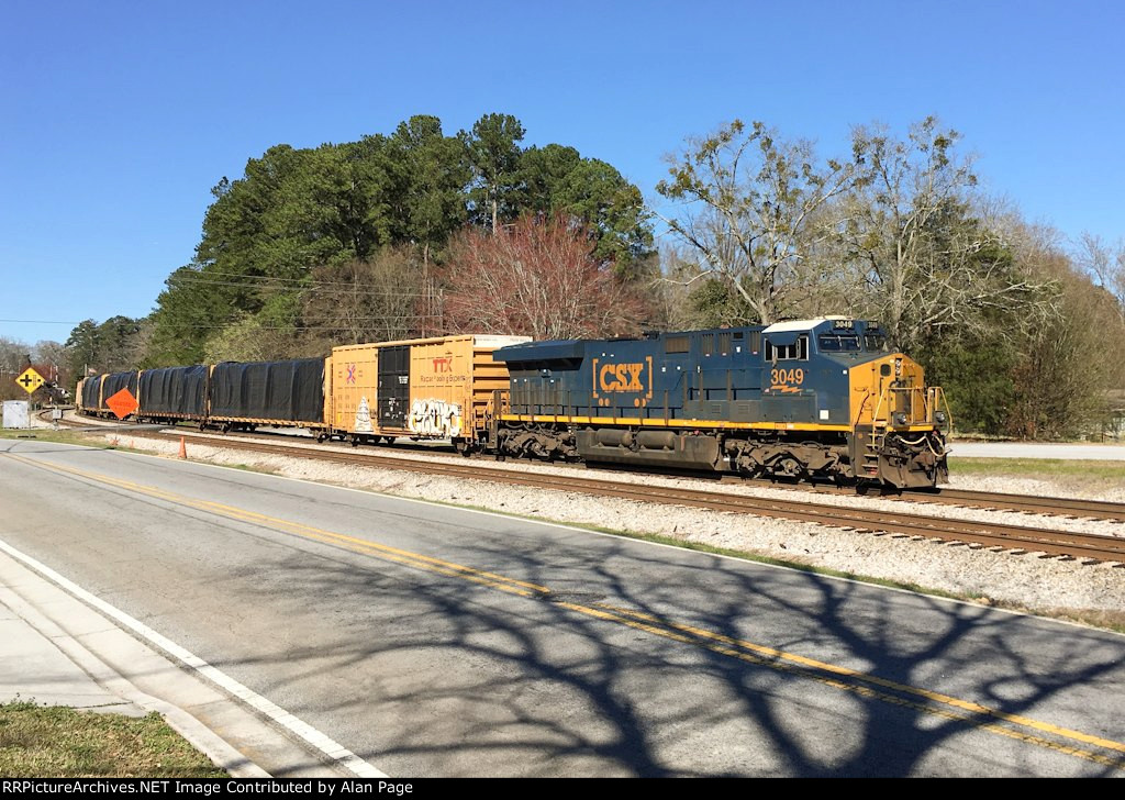 CSX 3049 gives a well-needed push at the tail end